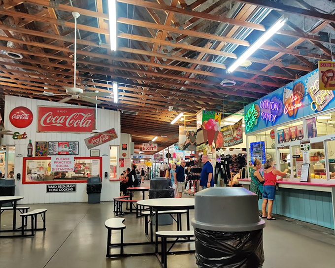 The food court offers a welcome respite for weary shoppers, with Coca-Cola memorabilia watching over hungry bargain hunters like carbonated guardian angels.