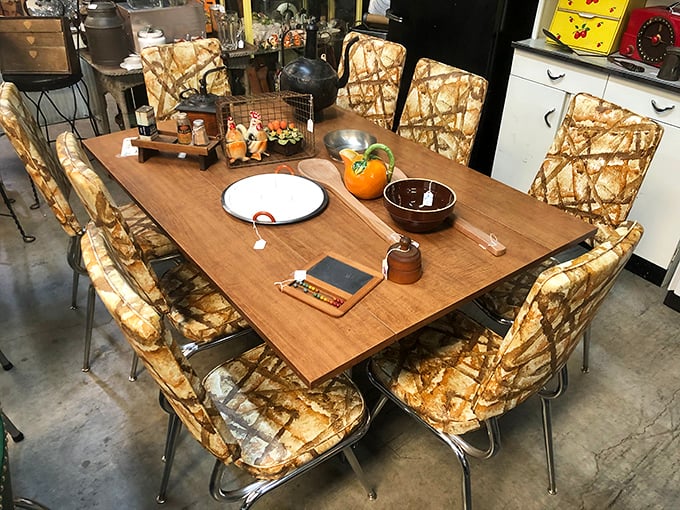 That geometric-patterned dining set screams 1970s dinner party – when fondue was fancy and conversation lasted past dessert.