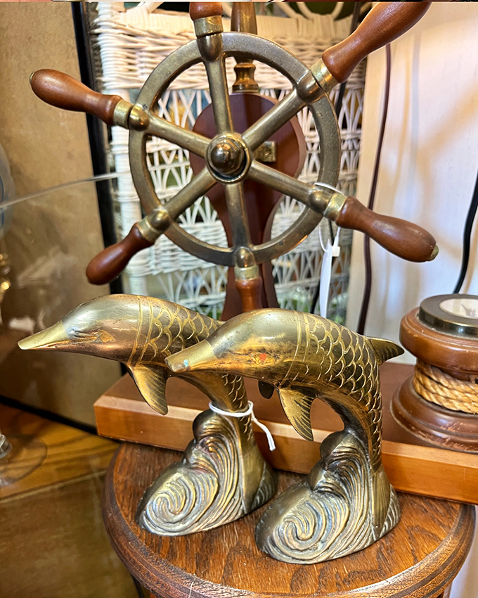 Those brass dolphins leaping over waves have more personality than most people at dinner parties &ndash; maritime decor done spectacularly right.