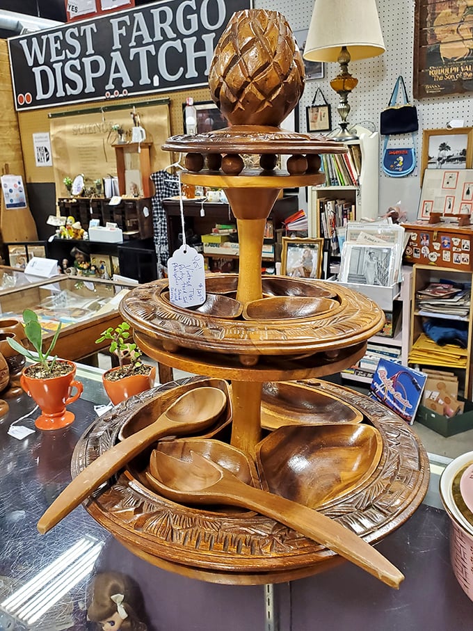 This handcrafted wooden serving tower isn't just functional art&mdash;it's a conversation piece that whispers stories from dinner parties past.