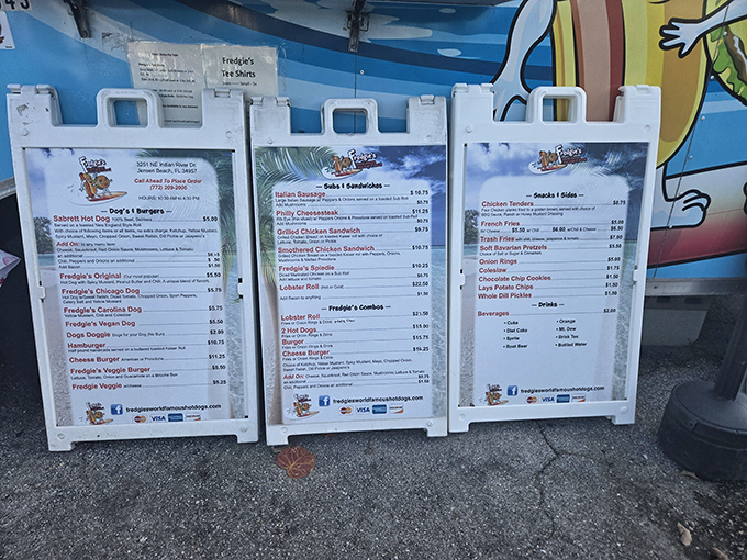 The menu boards tell a story of ambition that extends far beyond the humble hot dog. This isn't just lunch—it's an expedition.