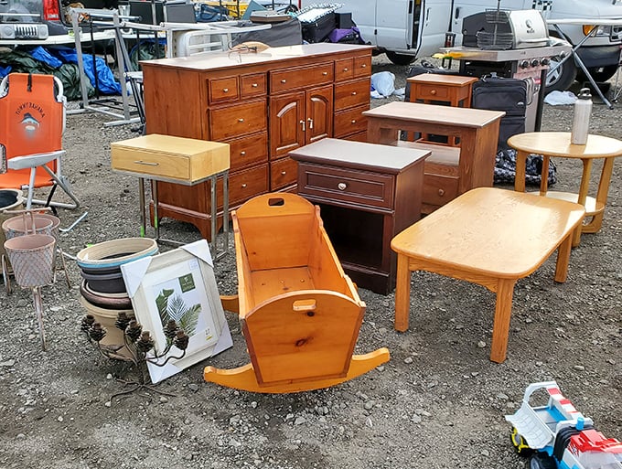 Furniture finds await their forever homes. That wooden cradle has probably seen more history than most history textbooks.