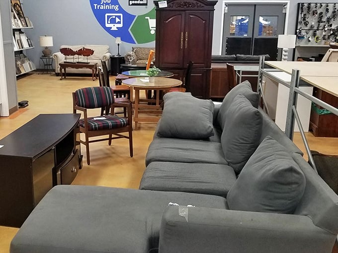 The furniture section resembles a living room time machine – that green sofa has stories to tell and is ready for its second act.