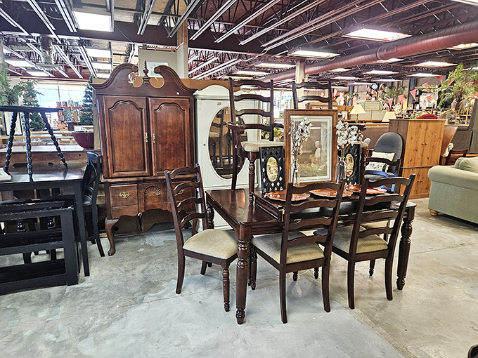 Furniture arranged like a museum of domestic life. That armoire could easily star in "Antiques Roadshow" while the dining set whispers of Sunday dinners past.