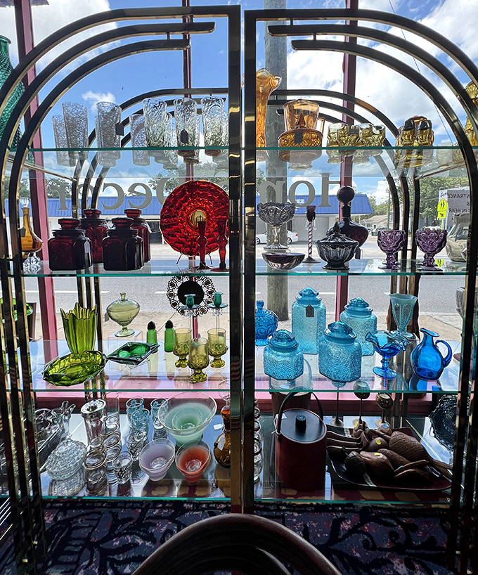 Sunlight transforms this vintage glassware display into a kaleidoscope of color. Imagine the cocktail parties these decanters have witnessed through the decades!