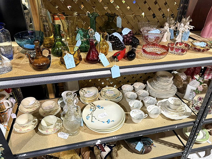 Colorful vintage glassware catches the light like jewels. Each piece whispers of dinner parties and special occasions from another era.