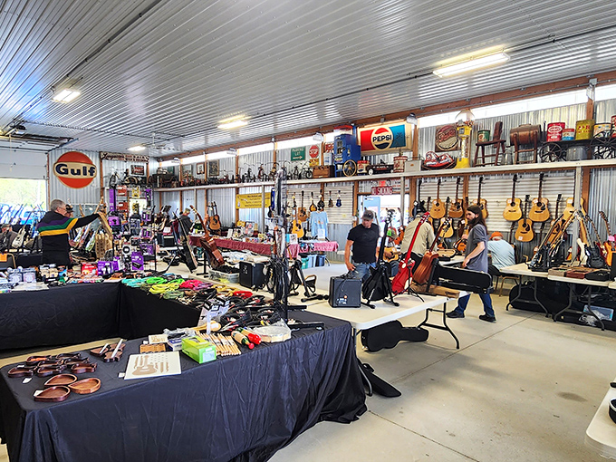 Not just guitars, but stories hanging on the wall. Each instrument waiting for new fingers to continue its musical journey.