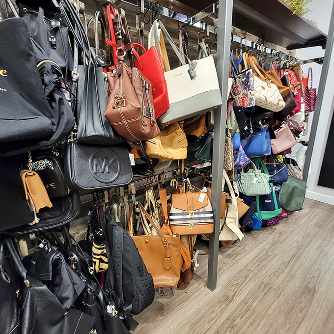 Handbag heaven! Designer purses hang like fashionable fruit, ripe for the picking, with Michael Kors and other coveted brands waiting for new homes.