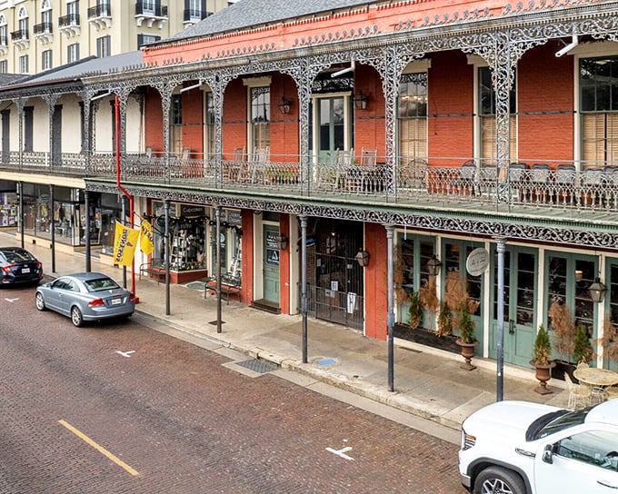 These aren't just pretty buildings—they're time machines with balconies. The intricate ironwork practically begs you to sip something cold while watching the world stroll by.