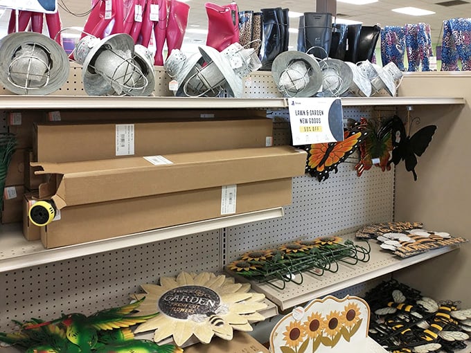 Garden d&eacute;cor and seasonal treasures cluster together like a yard sale curated by someone with actual taste.