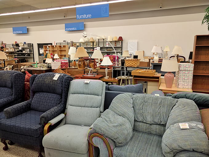 The furniture section: where yesterday's living rooms come to find tomorrow's families, complete with that perfect "just broken in" comfort.