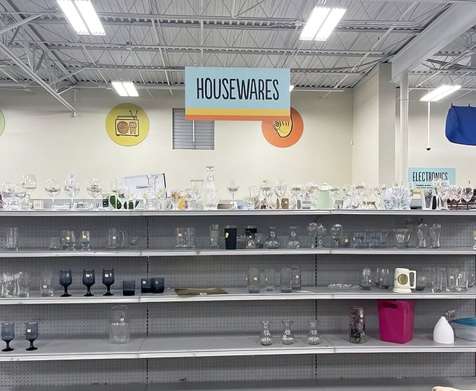 Crystal kingdom! The housewares section sparkles with potential dinner parties, each glass waiting to be filled with stories and wine.