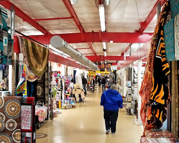 Long corridors of possibility stretch before you. Every booth is its own universe of collectibles, with colorful tapestries marking the boundaries between worlds. 