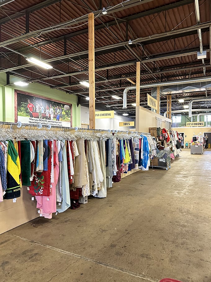 Clothing racks stretch toward the horizon like a fashionista's dream. The high ceilings and organized layout make treasure hunting a breeze.