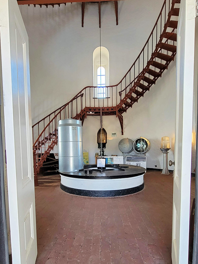 Step inside and you're greeted by a spiral staircase that would make Hitchcock jealous. Lighthouse living was never about minimalism.