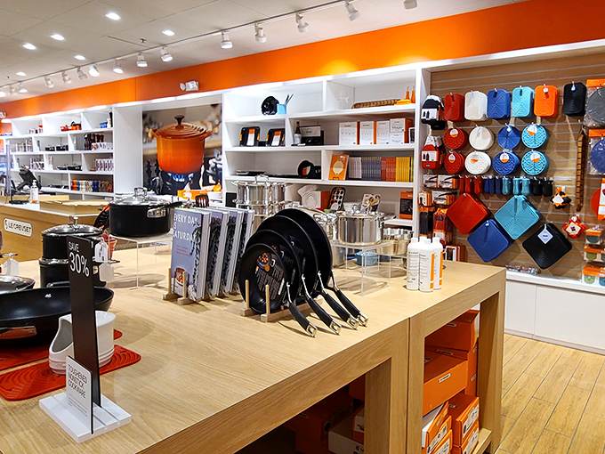 Le Creuset's vibrant cookware display is kitchen porn for culinary enthusiasts. That flame-orange Dutch oven is calling your name, even if you only make spaghetti.