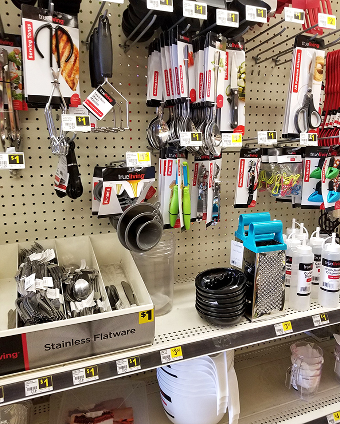 Kitchen gadget paradise where spatulas and measuring cups hang like practical ornaments on a tree of affordability. One-dollar stainless flatware? Yes, please!