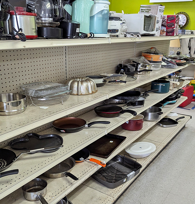 Kitchen utensil heaven! From cast iron to copper, these shelves hold more cooking potential than a season of Top Chef challenges.