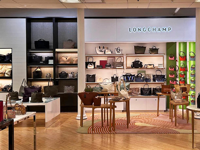 Longchamp's elegant display proves that French style and American bargain-hunting can coexist beautifully in this corner of Oregon.