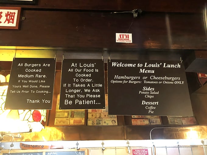 Rules of engagement clearly posted: no ketchup allowed, medium-rare is standard, and patience is non-negotiable. Consider yourself warned, condiment rebels.