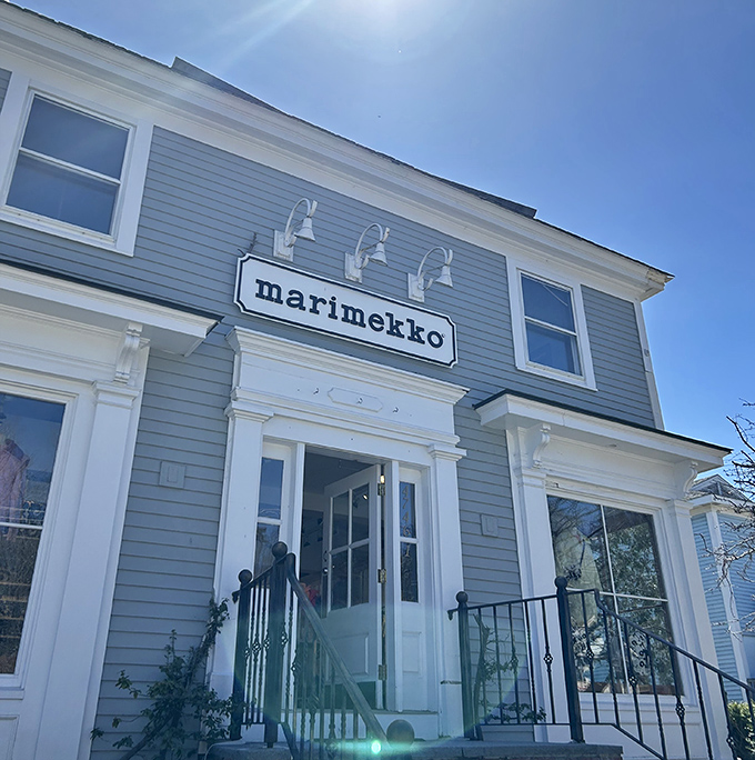 Marimekko's bold Finnish patterns pop against classic New England architecture &ndash; like finding a jazz club in a library, delightfully unexpected.