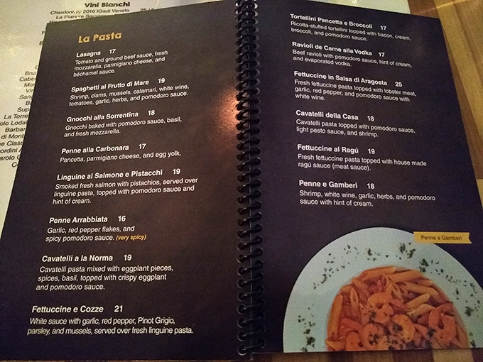 A menu that reads like a love letter to Italian cuisine. Each description makes you want to order everything and worry about your waistline tomorrow.