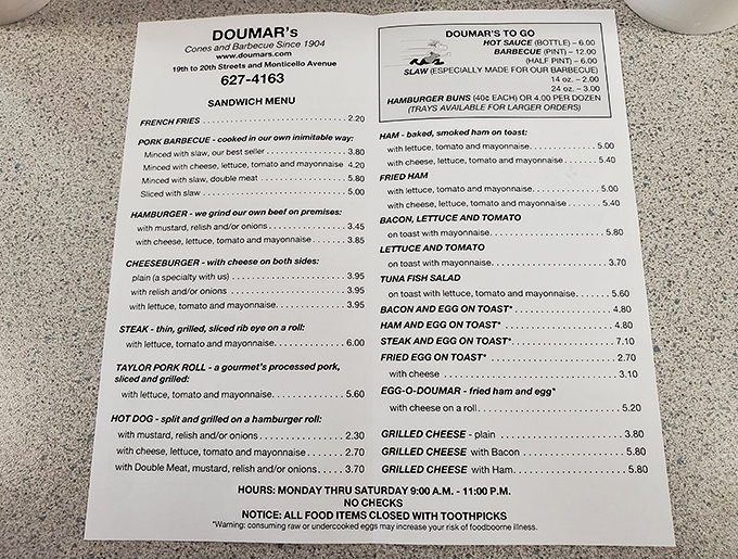 A menu that hasn't needed trendy updates because it got everything right the first time. Notice those toothpicks—the original food selfie sticks.