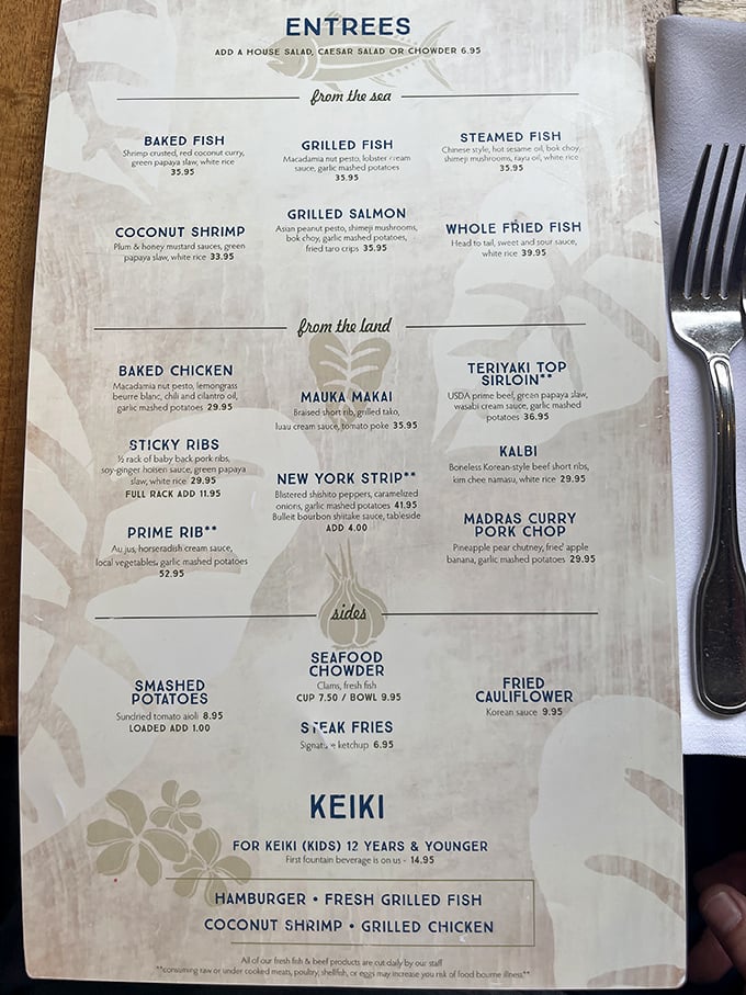 A menu that reads like a love letter to both land and sea. The prime rib listing alone has launched a thousand road trips from Honolulu.