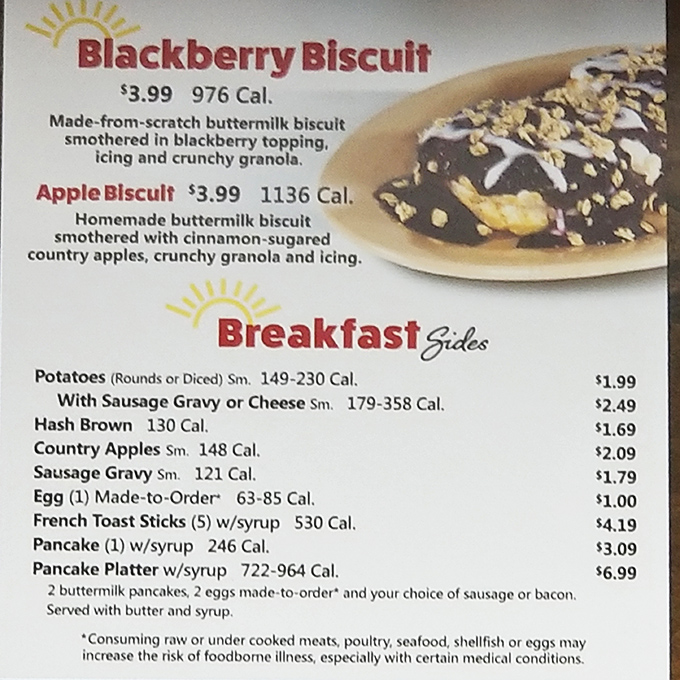 The menu board reveals Tudor's sweet secret weapons: blackberry and apple biscuits that blur the line between breakfast and dessert.