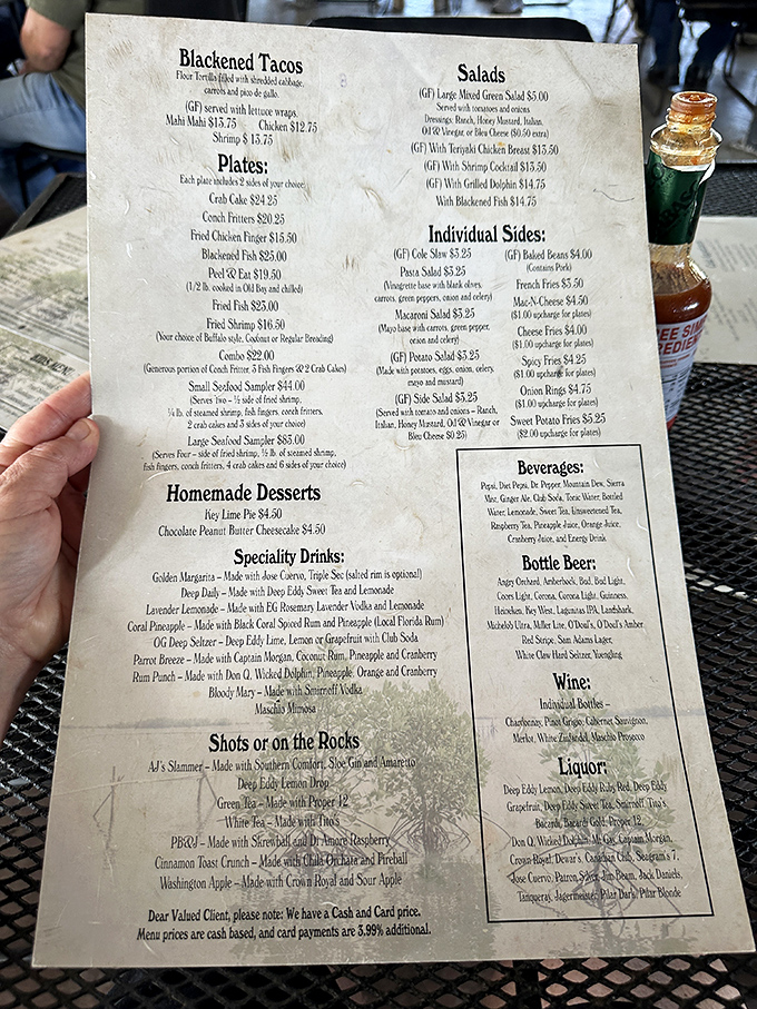 This menu isn't just a list of food &ndash; it's a treasure map to seafood nirvana. The blackened tacos and conch fritters are calling my name!