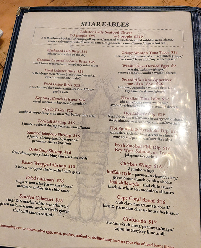 The "Shareables" menu reads like a greatest hits album of seafood dreams. Coconut Crusted Lobster Bites and Crabacado? My diet plan just filed for divorce.