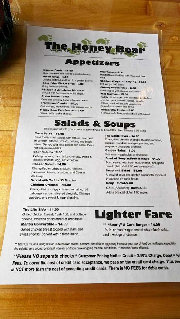 The menu reads like a love letter to Wisconsin comfort food &ndash; cheese curds, deep-fried pickle fries, and sandwiches that require strategic planning to finish.