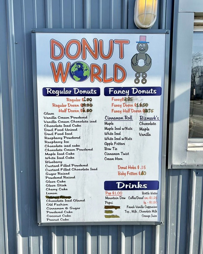 The menu board tells a story of donut democracy&mdash;Regular or Fancy, everyone deserves access to exceptional fried dough at Donut World.