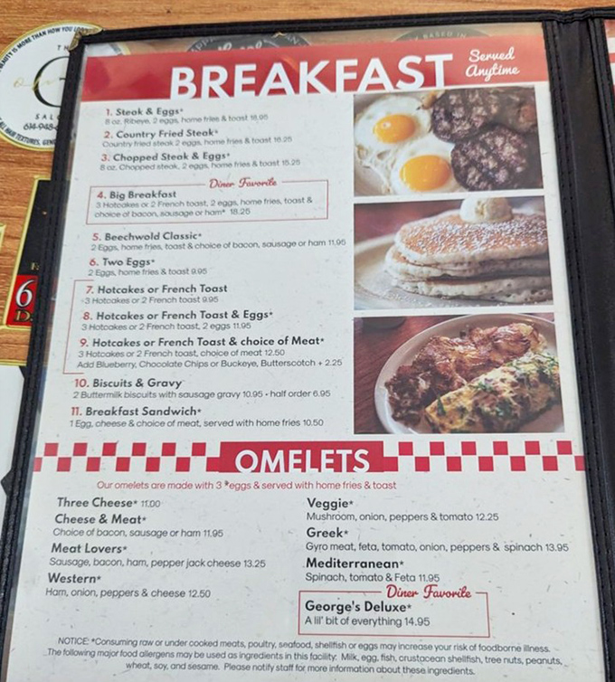 The menu reads like a love letter to breakfast classics—notice how "George's Deluxe" proudly wears its "Diner Favorite" badge of honor.