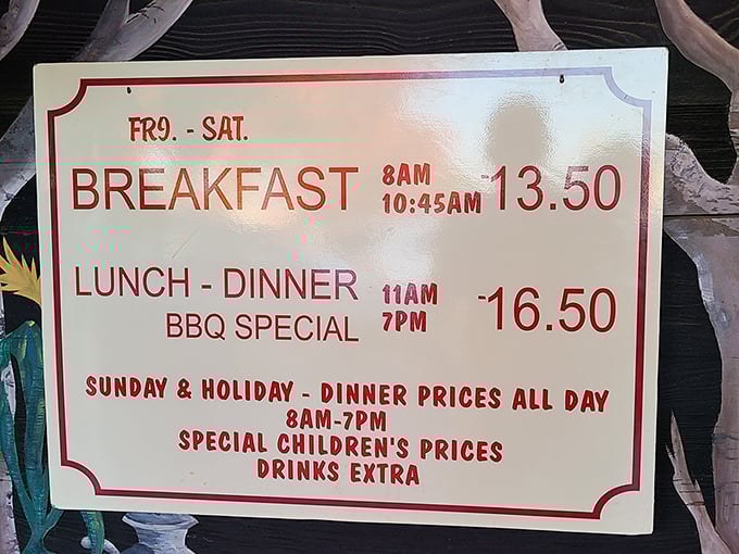 The menu board tells you everything you need to know: breakfast until 10, then lunch and dinner with BBQ specials. Your diet can resume tomorrow.