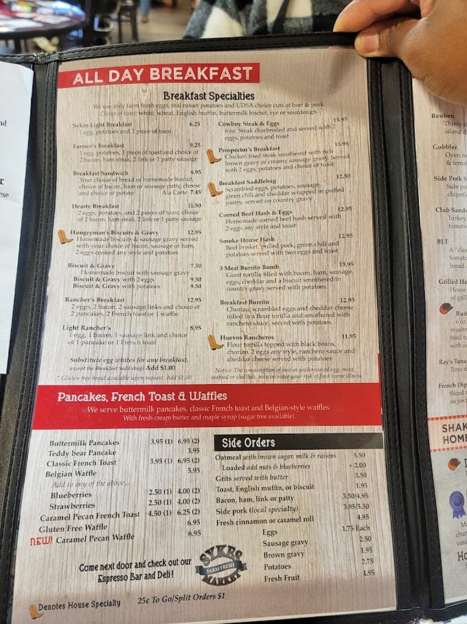 The breakfast bible of Kalispell. This menu isn't just a list of options&mdash;it's a roadmap to happiness with "All Day Breakfast" being the promised land.