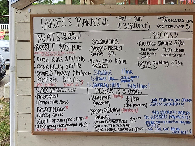 The chalkboard menu at Goldee's is like reading a love letter to smoked meat. No fancy fonts required when the offerings speak for themselves.