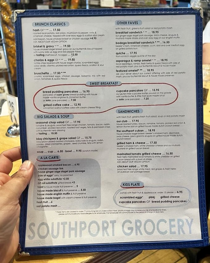 A menu that reads like a love letter to breakfast enthusiasts. Circle those bread pudding pancakes&mdash;they're the headliners for good reason.