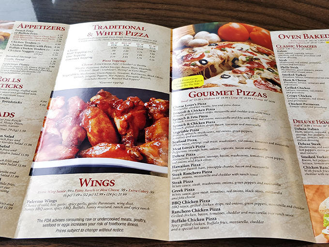 The menu tells the whole delicious story &ndash; wings get center stage billing for good reason, while the extensive pizza options promise tough decisions ahead.