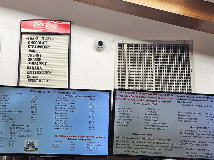 The menu board speaks the universal language of comfort food. No fancy descriptions needed when you've mastered the art of the perfect burger.