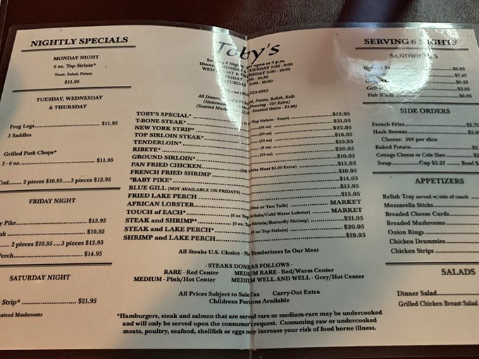 A menu that reads like a love letter to Midwest cuisine. Each line promises comfort that no trendy small plate could ever deliver. 