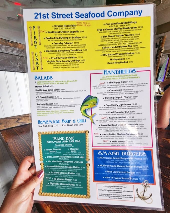 A menu that reads like a love letter to the ocean. Each laminated page promises adventures your taste buds have been dreaming about since your last beach trip.