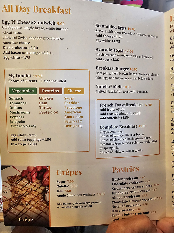 The menu reads like a love letter to French cuisine, with everything from buttery croissants to hearty breakfast options that'll make you say "oui, s'il vous plaît!"