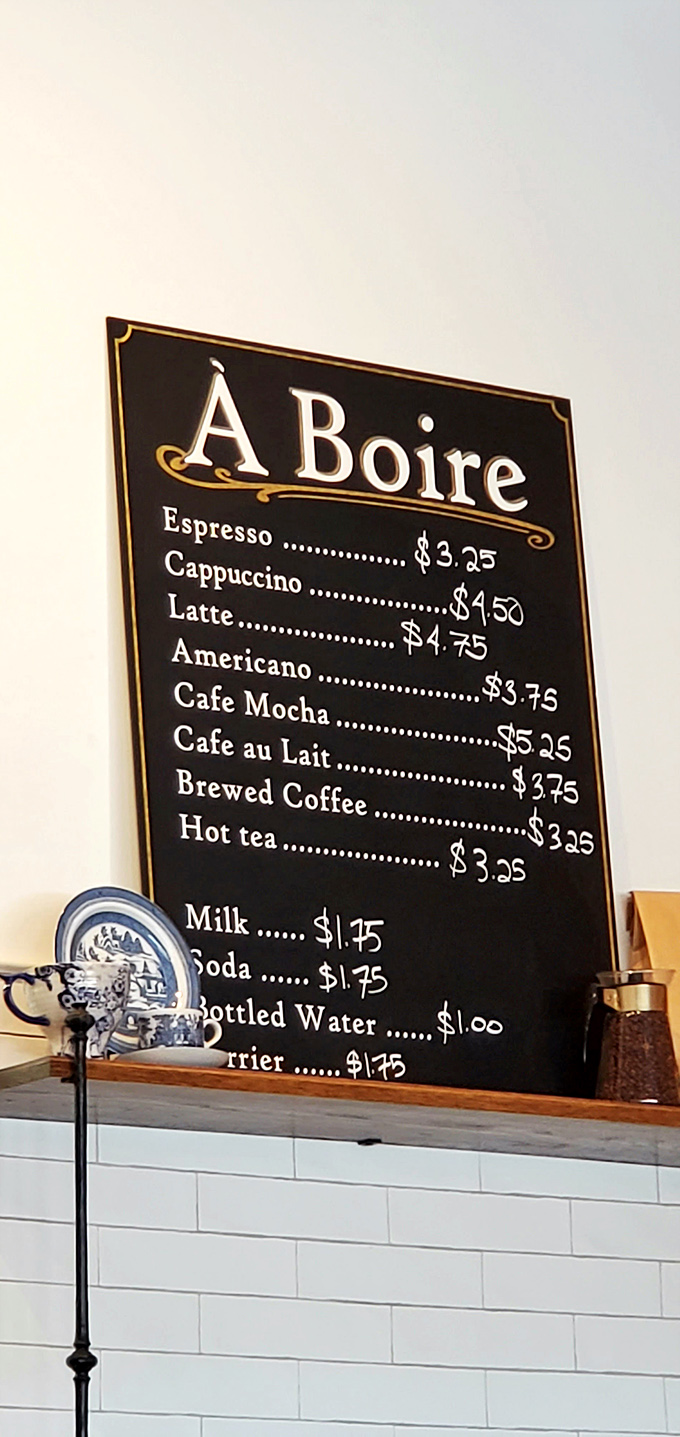 The drink menu reads like poetry. "À Boire" isn't just French for "to drink"—it's an invitation to linger over something civilized.