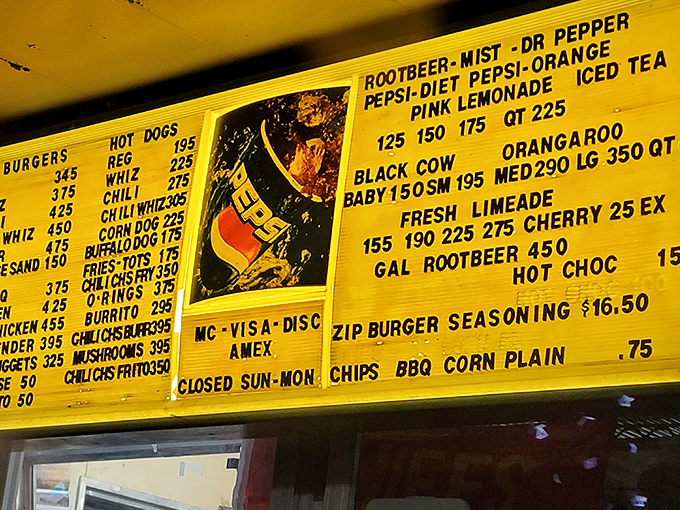 That yellow menu board reads like a love letter to American comfort food &ndash; no fancy fonts needed here.