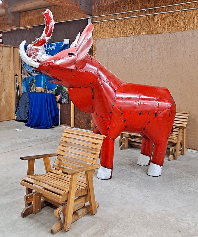 The red metal bull sculpture stands guard like a whimsical sentinel. Perfect for the person who has everything except a giant metal bovine.