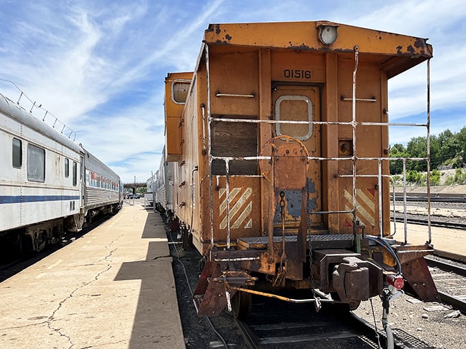 This weathered caboose has seen more of America than most people, its rusty orange exterior telling tales of countless journeys.
