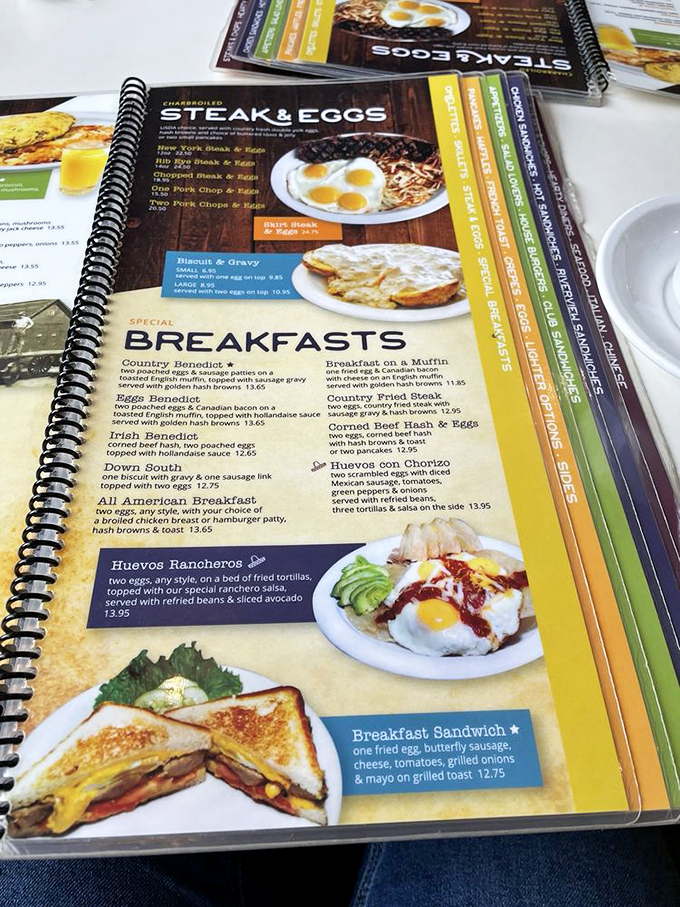The menu reads like a love letter to breakfast classics. Those Huevos Rancheros are calling my name louder than my alarm clock ever could.