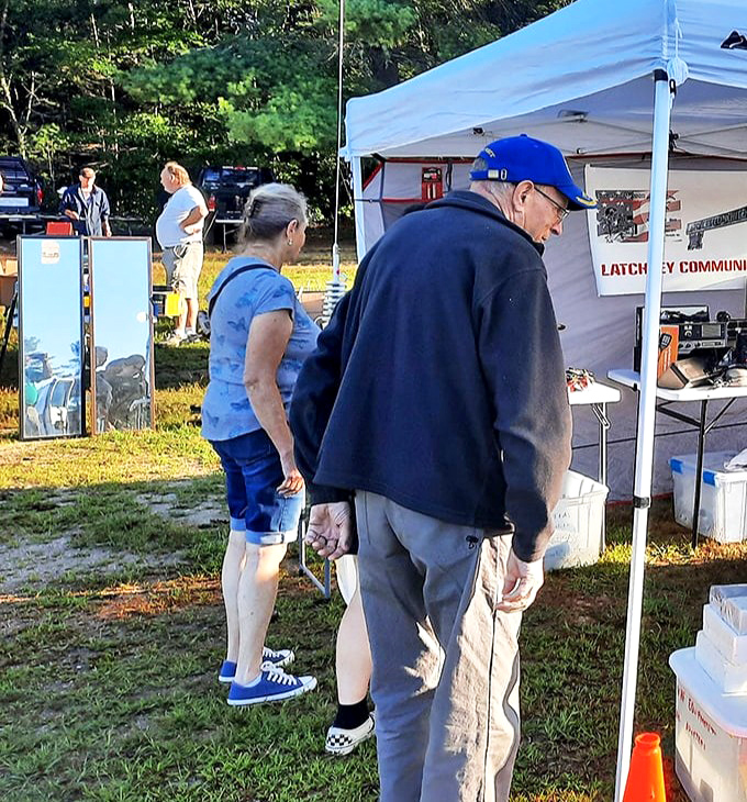 Serious shoppers scan tables with the focus of archaeologists, knowing the difference between junk and gems often comes down to who's looking.