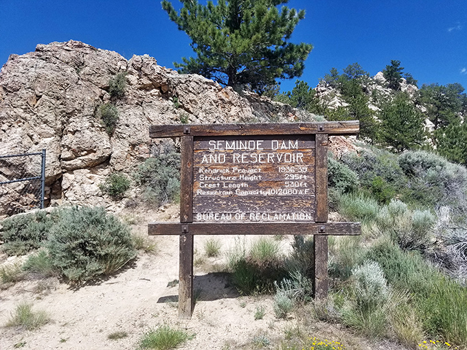 History carved in wood &ndash; this sign tells the tale of engineering triumph that created one of Wyoming's most spectacular hidden gems.